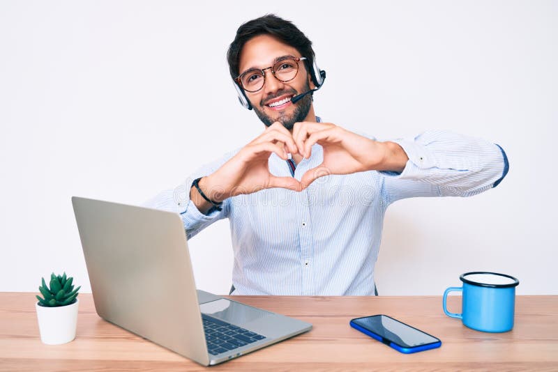 Handsome Hispanic Man Working at the Office Wearing Operator Headset ...