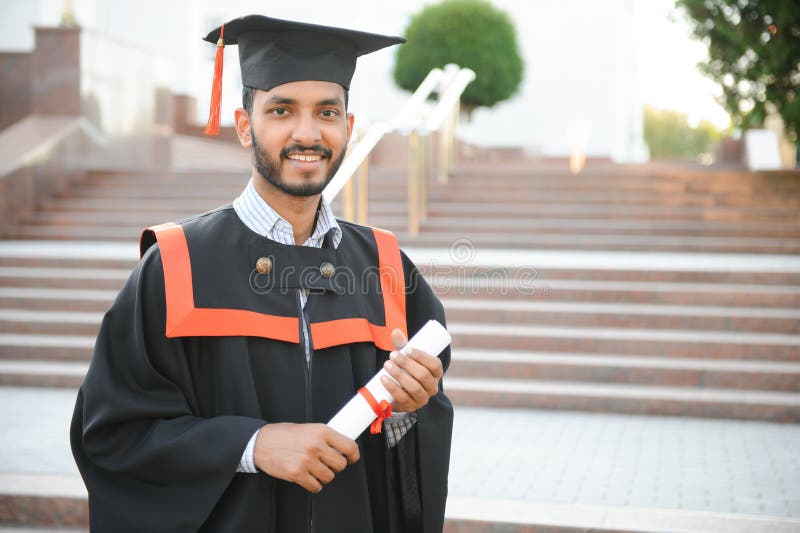 Handsome Indian Graduate in Graduation Glow with Diploma. Stock Image ...