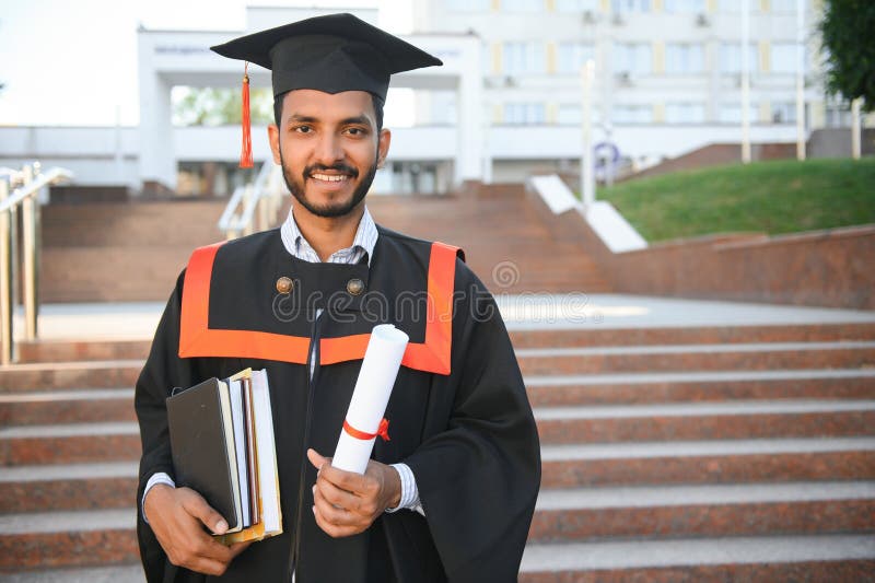 Handsome Indian Graduate in Graduation Glow with Diploma. Stock Image ...