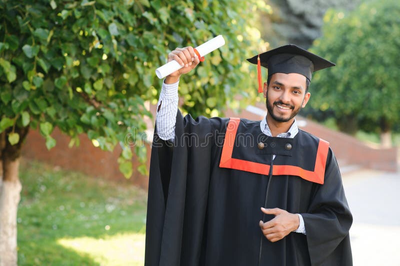 Handsome Indian Graduate in Graduation Glow with Diploma. Stock Image ...