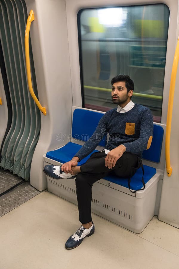 Handsome Indian Man Posing in a Metro Car Stock Photo - Image of people ...