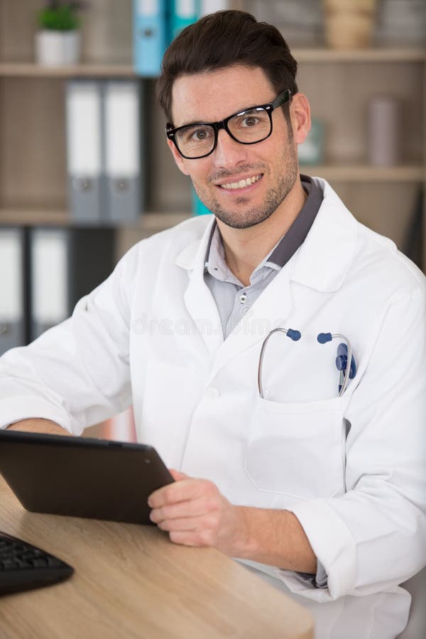 Handsome Intelligent Doctor Using Tablet Pc Stock Photo - Image of ...