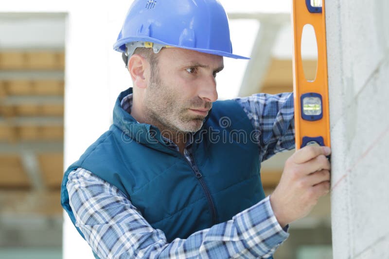 Handsome Laborer with Level Tool Stock Image - Image of checking ...