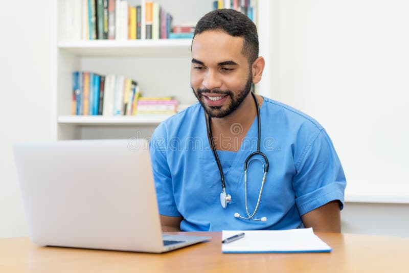 Handsome Latin American Medical Student at Computer Stock Image - Image ...