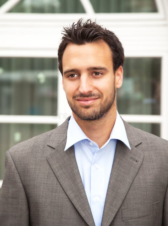 Handsome Latin Businessman Smiling in Front of His Office Stock Image ...