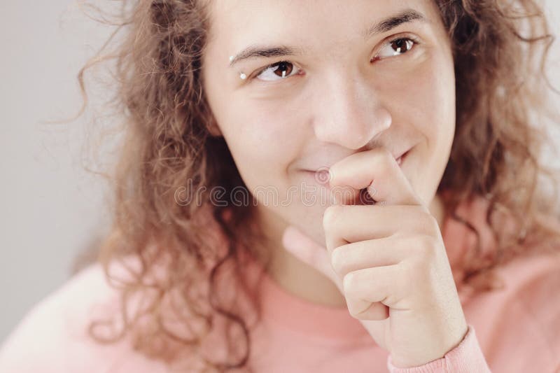 Handsome Long-haired Guy, Eyebrow Piercing, Thinking Gesture, Pi Stock ...