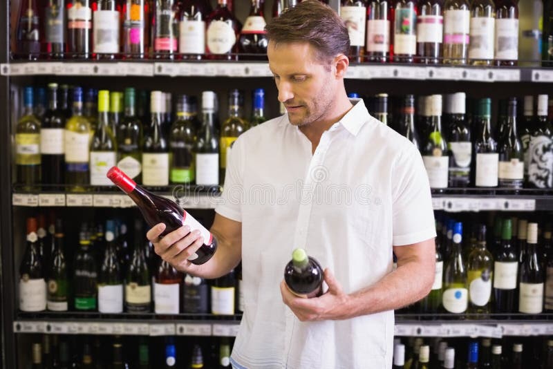 A Handsome Looking at Wine Bottle Stock Image - Image of business ...