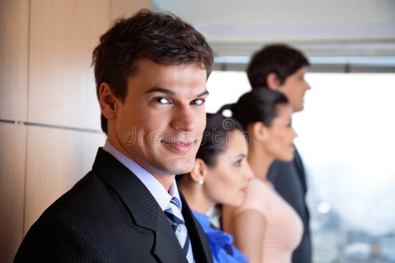 Handsome Male Executive Smiling Stock Image - Image of colleague, male ...