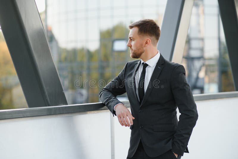 Handsome Male Model Posing Wearing a Back Suit. Stock Image - Image of ...