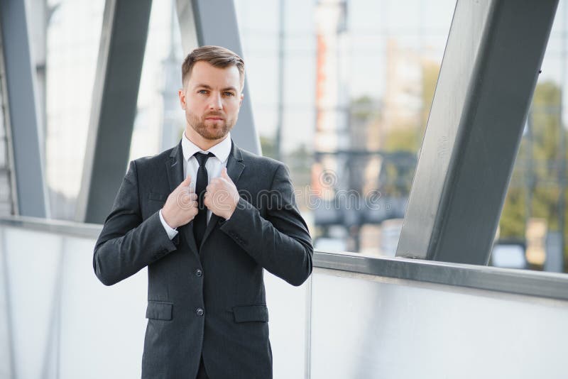 Handsome Male Model Posing Wearing a Back Suit. Stock Image - Image of ...
