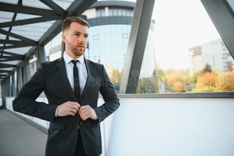 Handsome Male Model Posing Wearing a Back Suit. Stock Photo - Image of ...