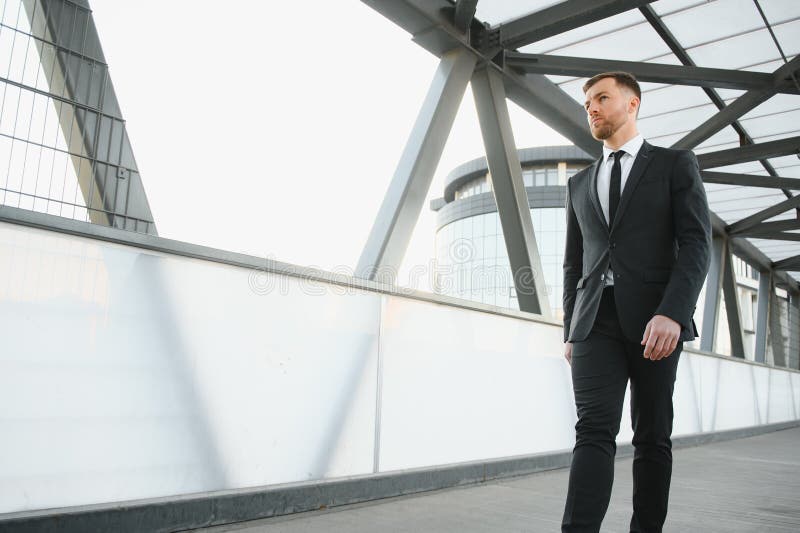 Handsome Male Model Posing Wearing a Back Suit. Stock Photo - Image of ...