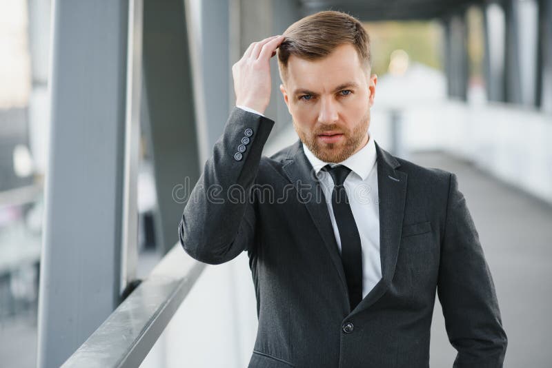 Handsome Male Model Posing Wearing a Back Suit. Stock Image - Image of ...