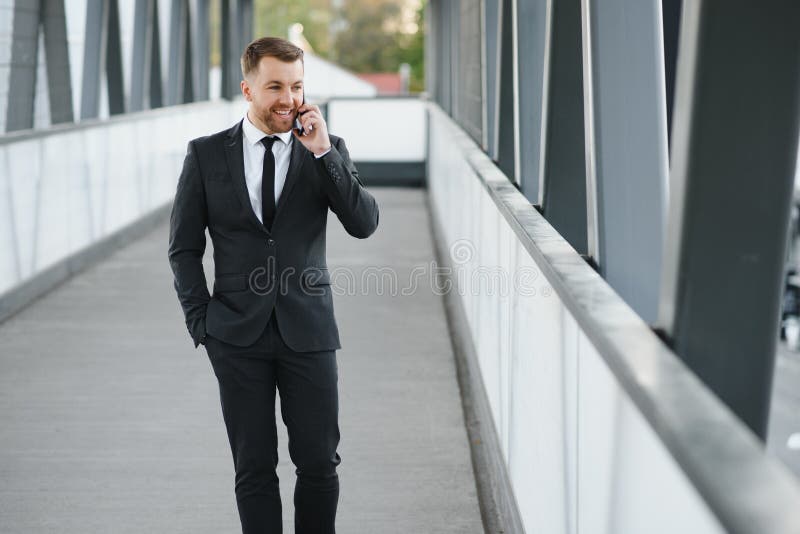 Handsome Male Model Posing Wearing a Back Suit. Stock Photo - Image of ...