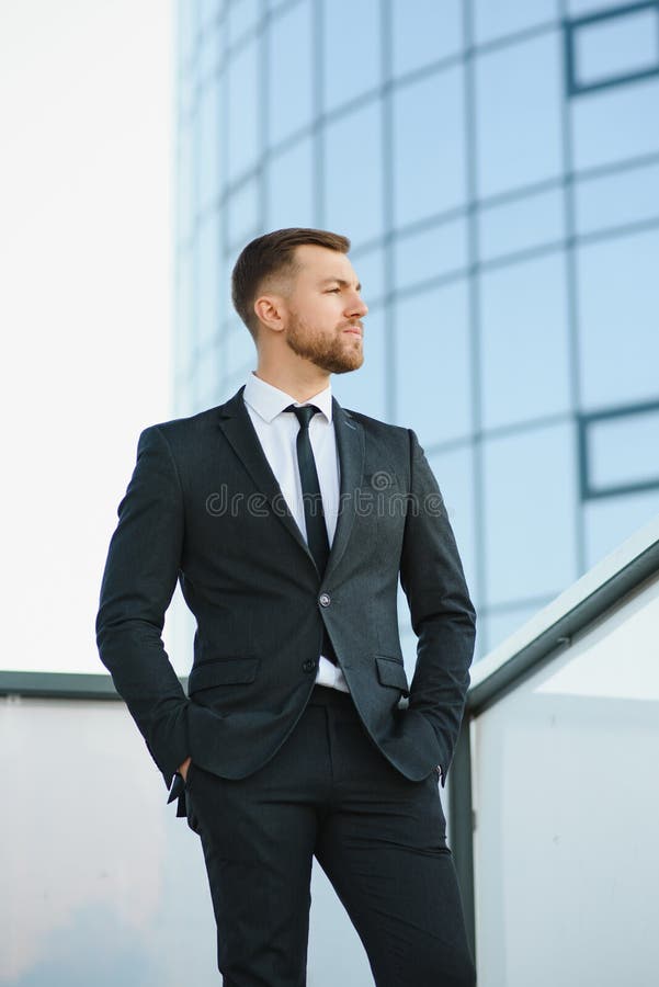 Handsome Male Model Posing Wearing a Back Suit. Stock Image - Image of ...