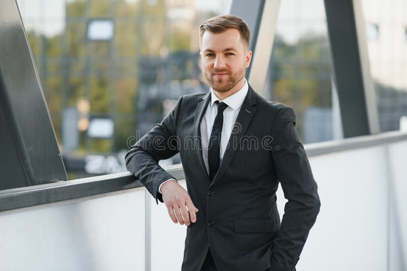 Handsome Male Model Posing Wearing a Back Suit. Stock Photo - Image of ...