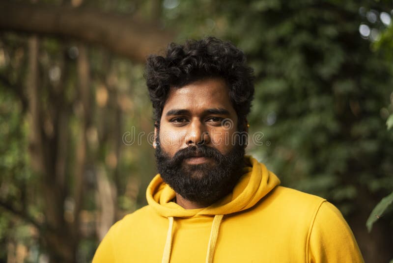 Handsome Male Model in a Public Park, Male Model with Green Background ...