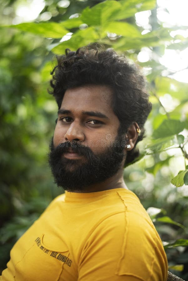 Handsome Male Model in a Public Park, Male Model with Green Background ...