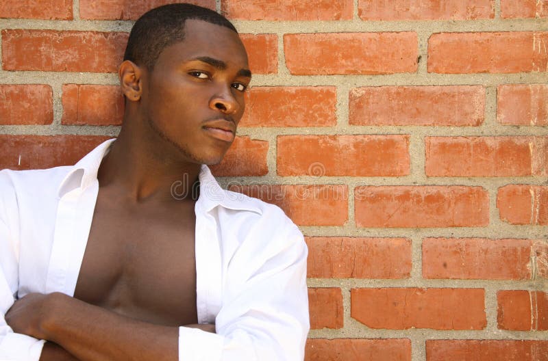 Handsome Male Model with Serious Look and Arms Fol Stock Photo - Image ...