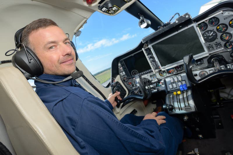Handsome Male Pilot in Cockpit Stock Photo - Image of smiling ...