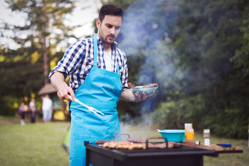 Handsome Male Preparing Barbecue Stock Image - Image of meal, party: 89813675