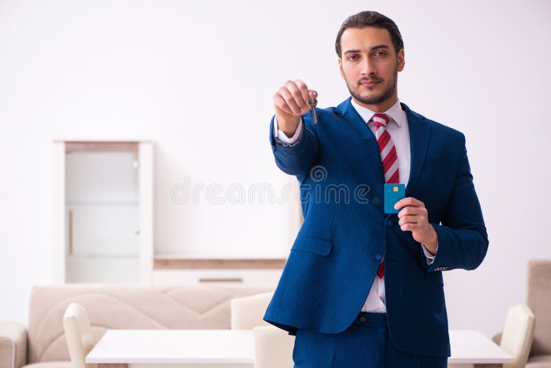 Handsome Male Realtor Working Indoors Stock Image - Image of broker ...