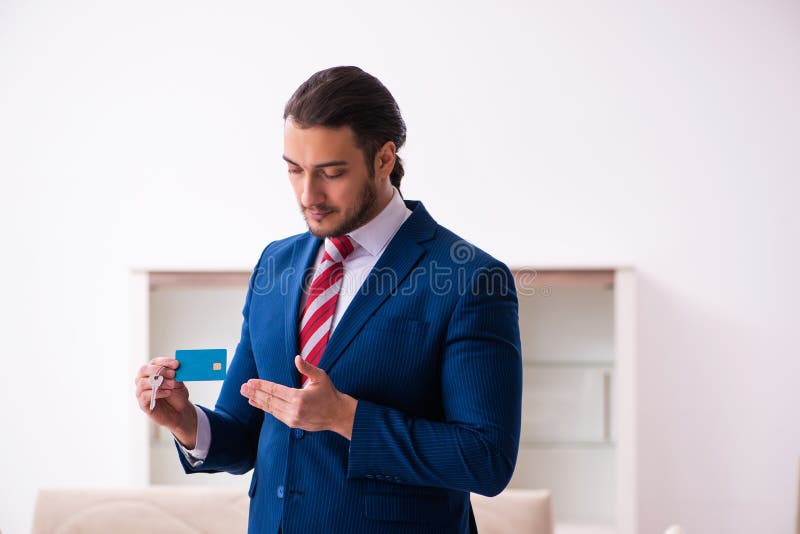 Handsome Male Realtor Working Indoors Stock Photo - Image of home ...