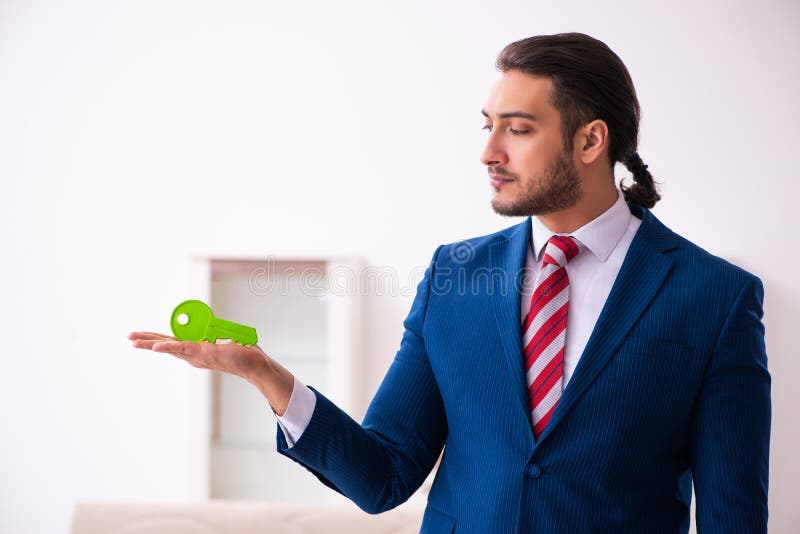Handsome Male Realtor Working Indoors Stock Image - Image of flat ...
