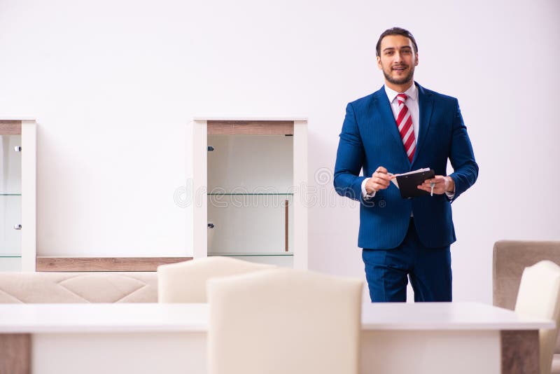 Handsome Male Realtor Working Indoors Stock Image - Image of buyer ...