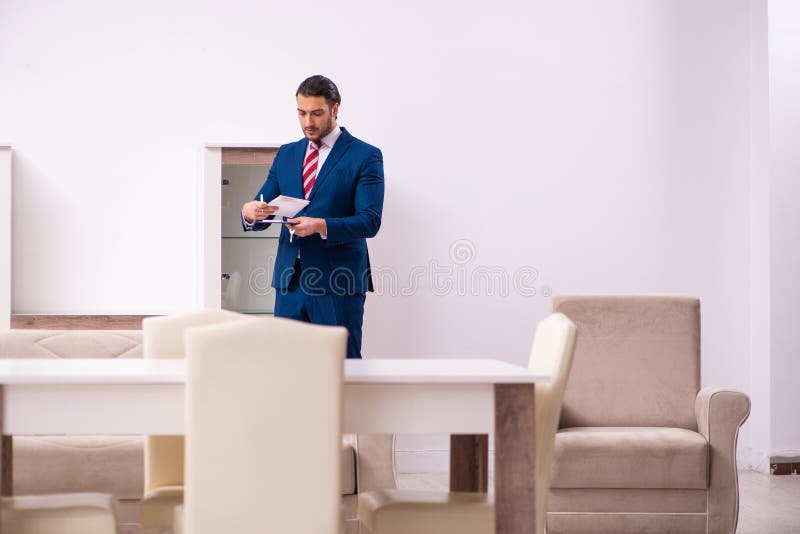 Handsome Male Realtor Working Indoors Stock Image - Image of estate ...