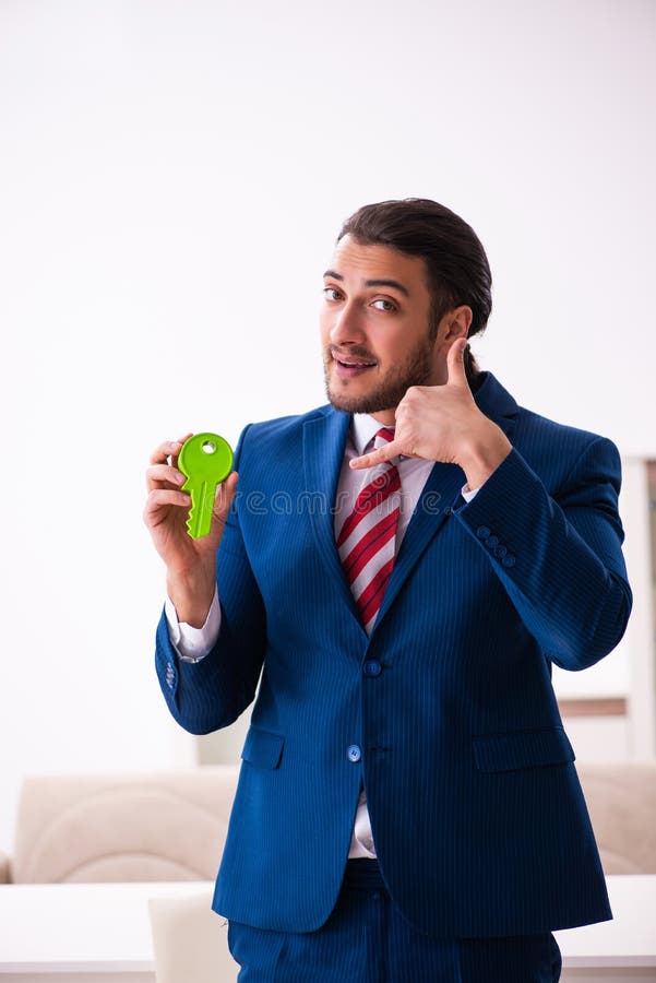 Handsome Male Realtor Working Indoors Stock Photo - Image of broker ...
