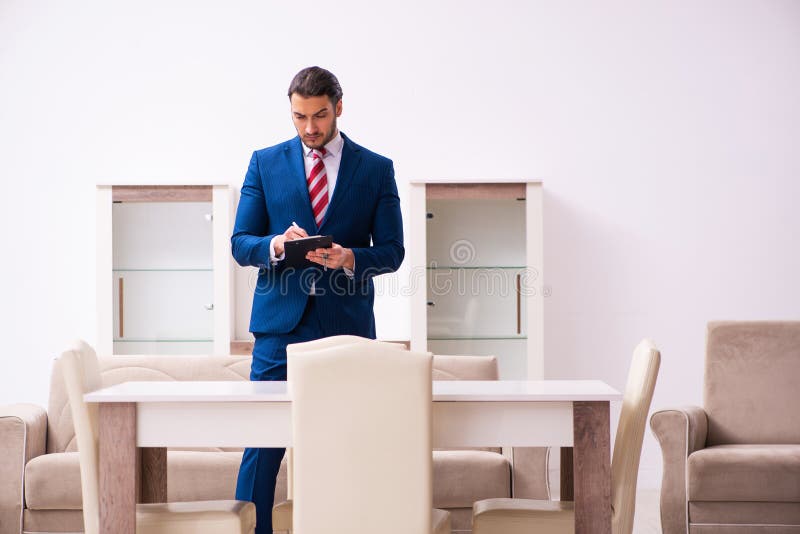 Handsome Male Realtor Working Indoors Stock Photo - Image of mortgage ...