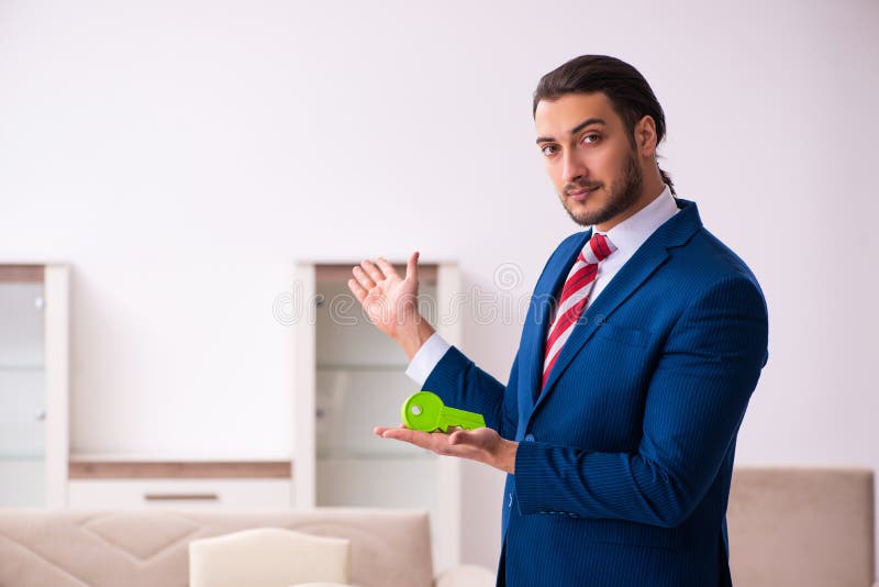 Handsome Male Realtor Working Indoors Stock Image - Image of realtor ...
