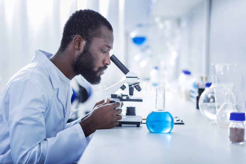 Handsome Male Scientist Looking into the Microscope Stock Image - Image ...
