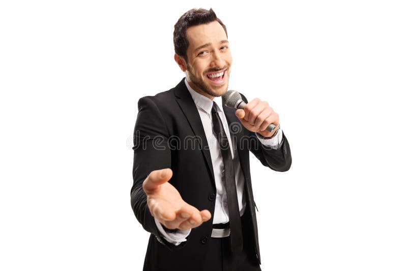 Handsome Male Singer in a Black Suit Singing on a Microphone Stock ...