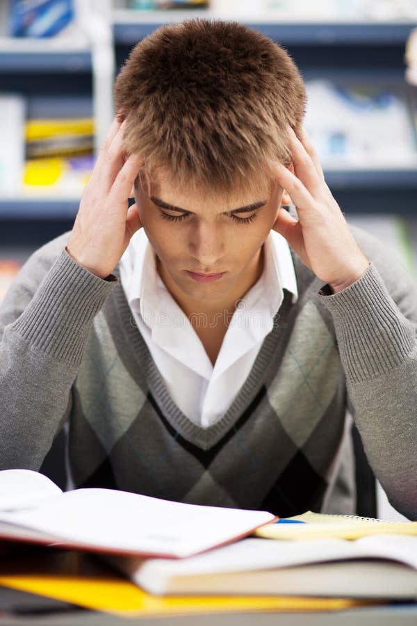 Handsome Male Student in a Library Stock Image - Image of books ...