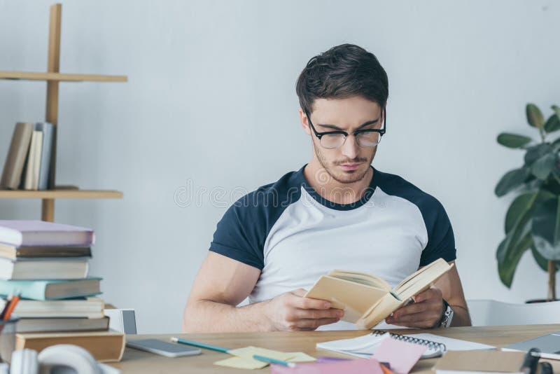 Handsome Male Student Reading Stock Image - Image of casual, read ...