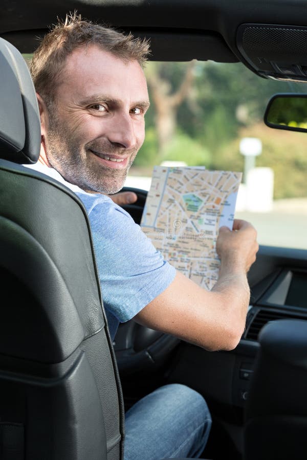 Handsome Male Using Map on Road Trip Stock Image - Image of holiday ...
