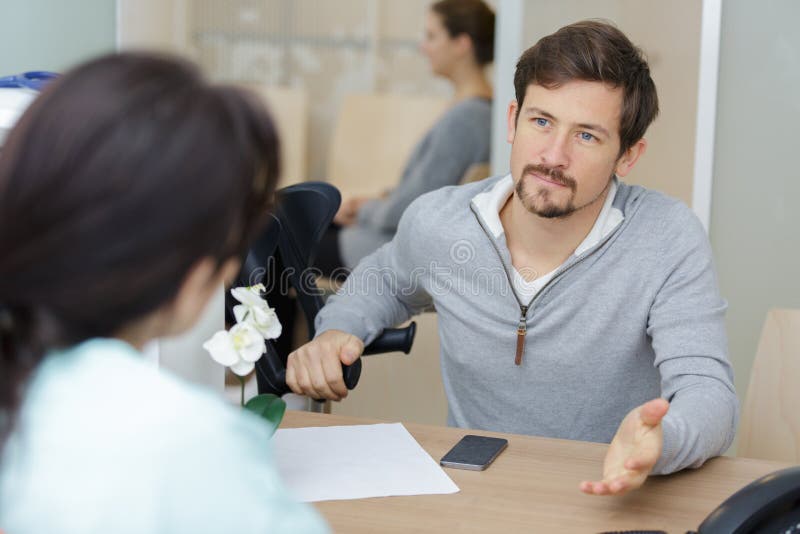 Handsome Male Worker Talking To Secretary Stock Image - Image of ...