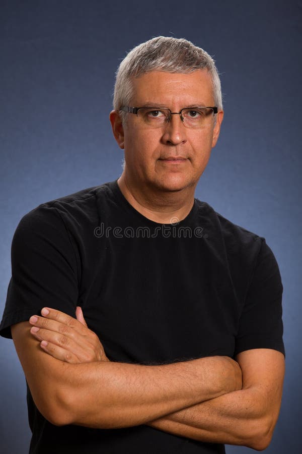Handsome Middle Aged Man Looking Pensive in the Sun Stock Image - Image ...