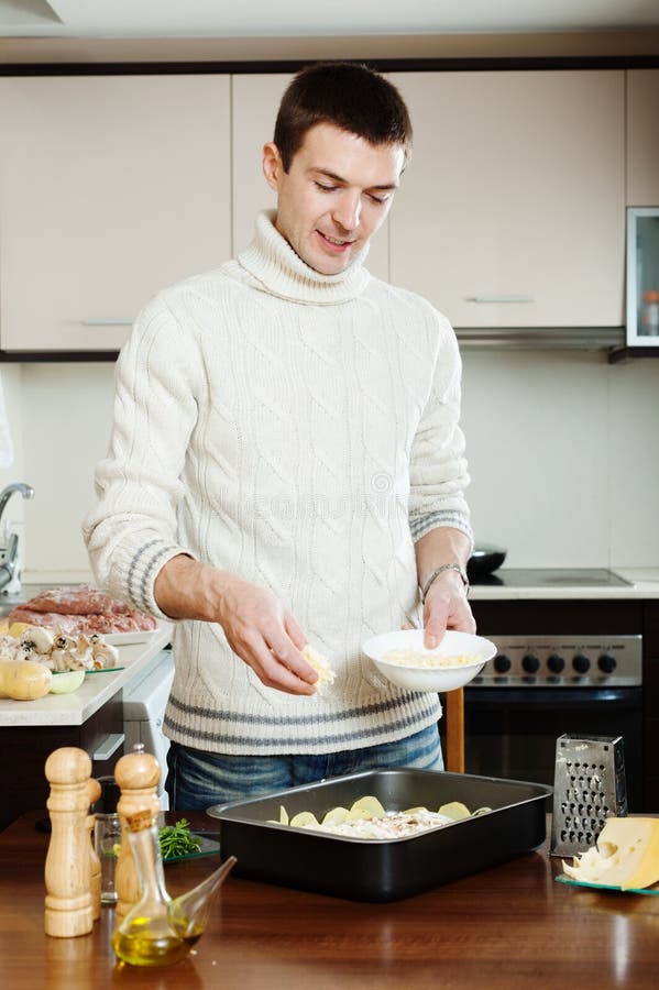 Handsome Man Adding Grated Cheese Roasting Pan Stock Photos - Free ...