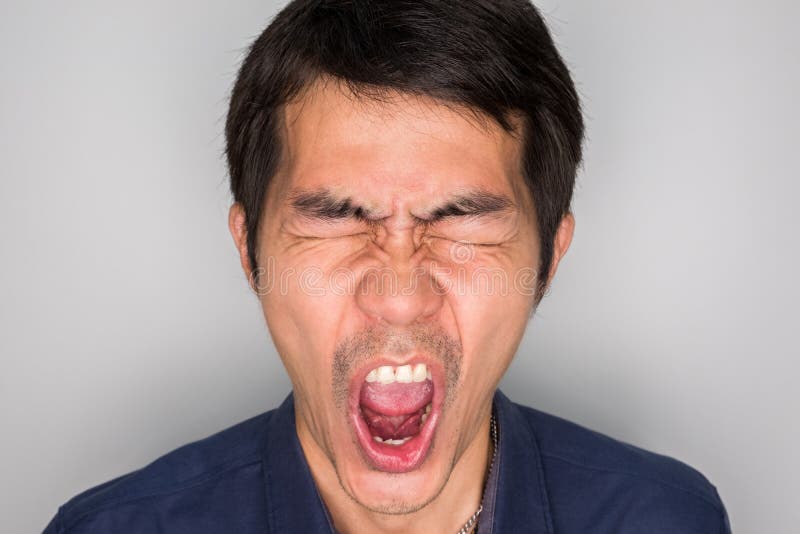 A Handsome Man in Angry Feeling. Angry is Negative Feeling Stock Photo ...