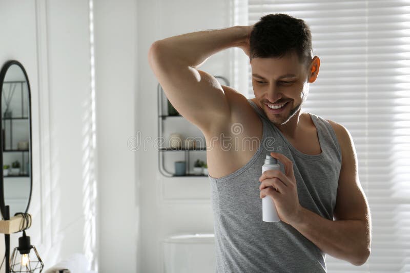 136 Man Putting Deodorant Photos - Free & Royalty-Free Stock Photos ...