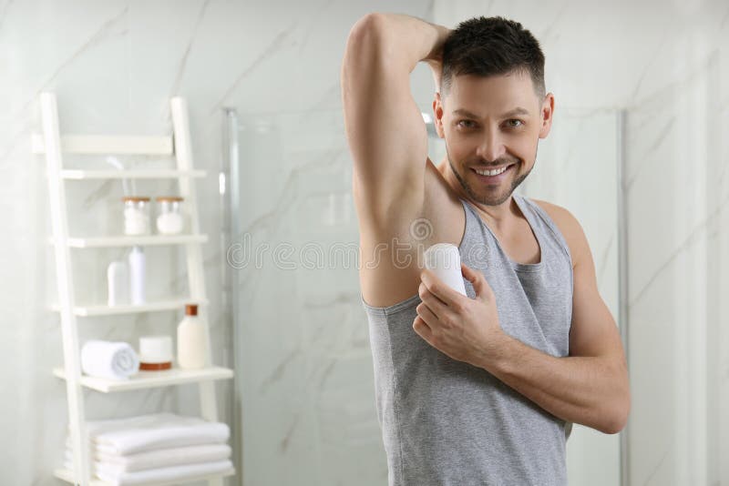 136 Man Putting Deodorant Photos - Free & Royalty-Free Stock Photos ...