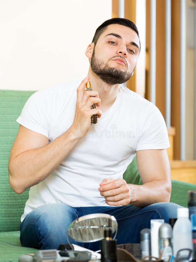 Handsome Man Applying Perfum Stock Image - Image of masculinity, modern ...