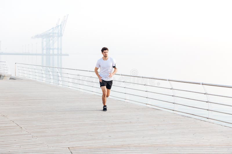 Handsome Man Athlete Running in the Morning Stock Image - Image of ...