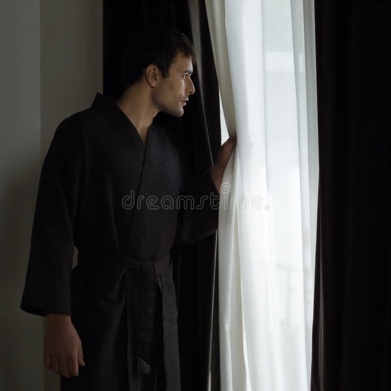 Handsome man in a bathrobe stock photo. Image of white - 37701980