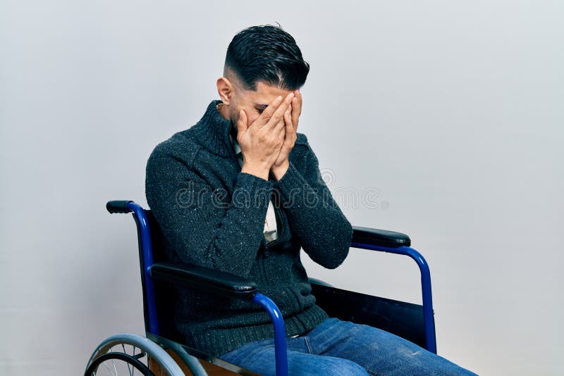 Handsome Man with Beard Sitting on Wheelchair with Sad Expression ...
