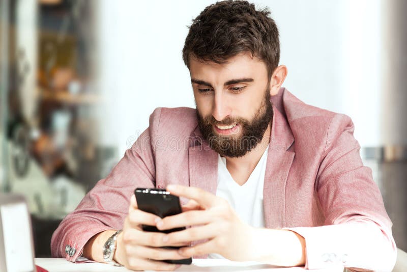 Handsome Man with Beard Texting. Stock Photo - Image of cool ...