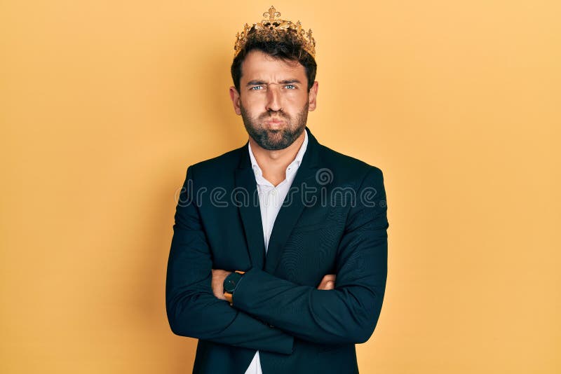 Handsome Man With Beard Wearing Business Suit With Arms Crossed Gesture